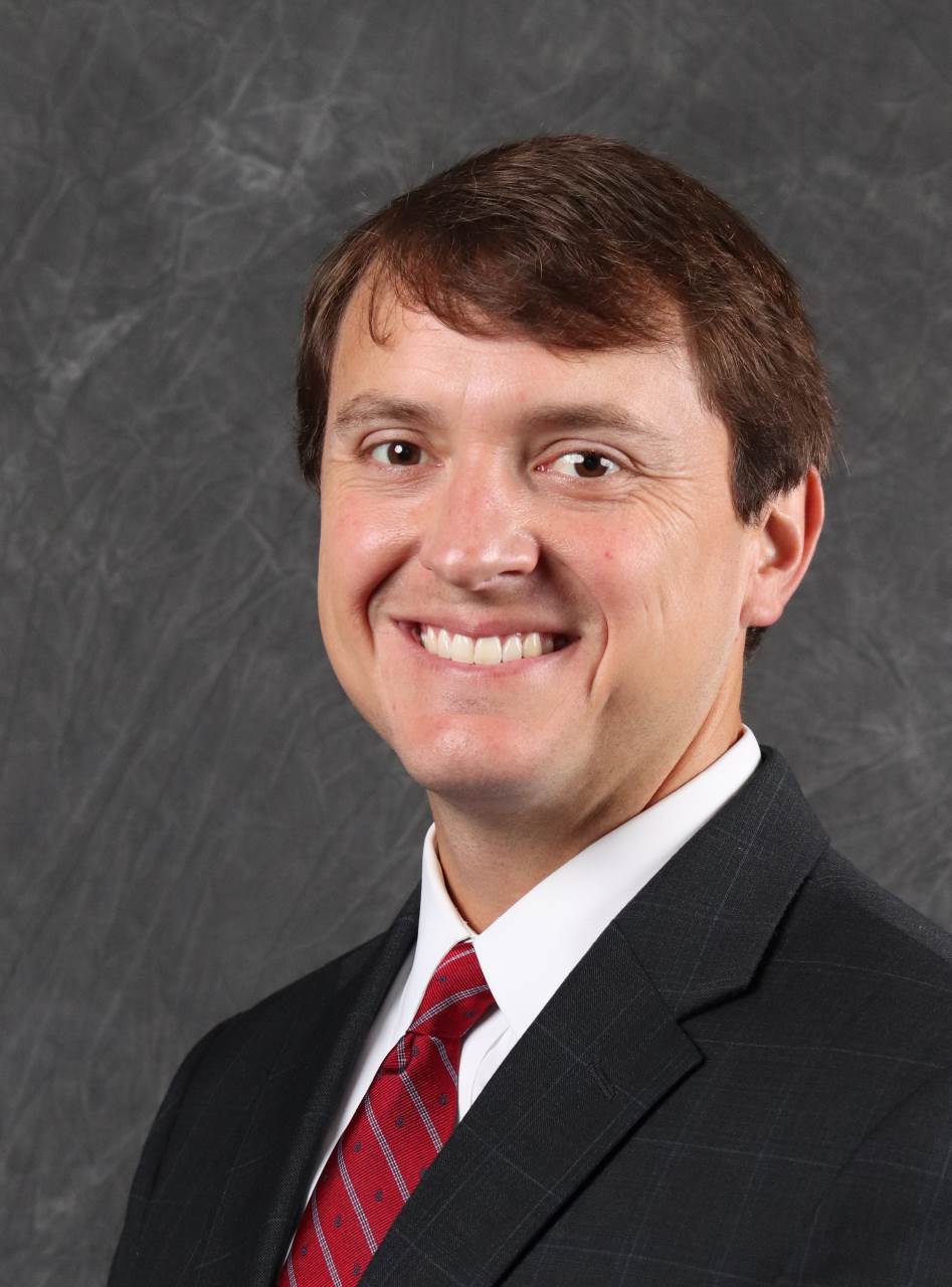 Evans named Area Coach of the Year for cross country